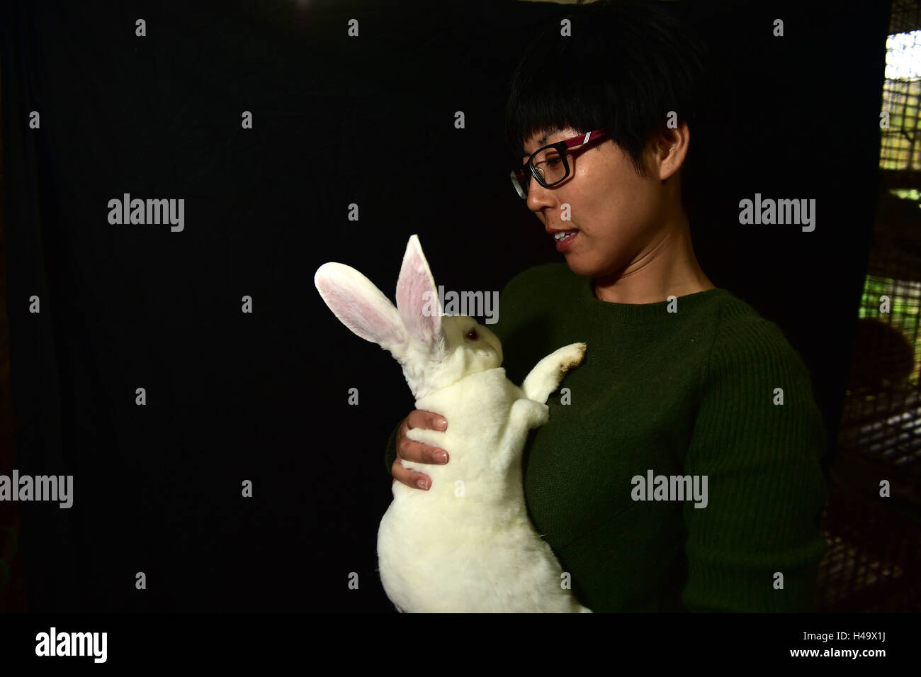 Hefei, China's Anhui Province. 11th Oct, 2016. Xing Cuicui looks at the ...