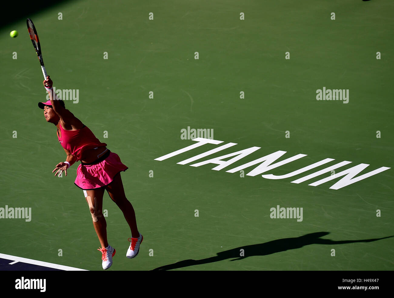 Tianjin, China. 14th Oct, 2016. Han Xinyun of China serves during the ...