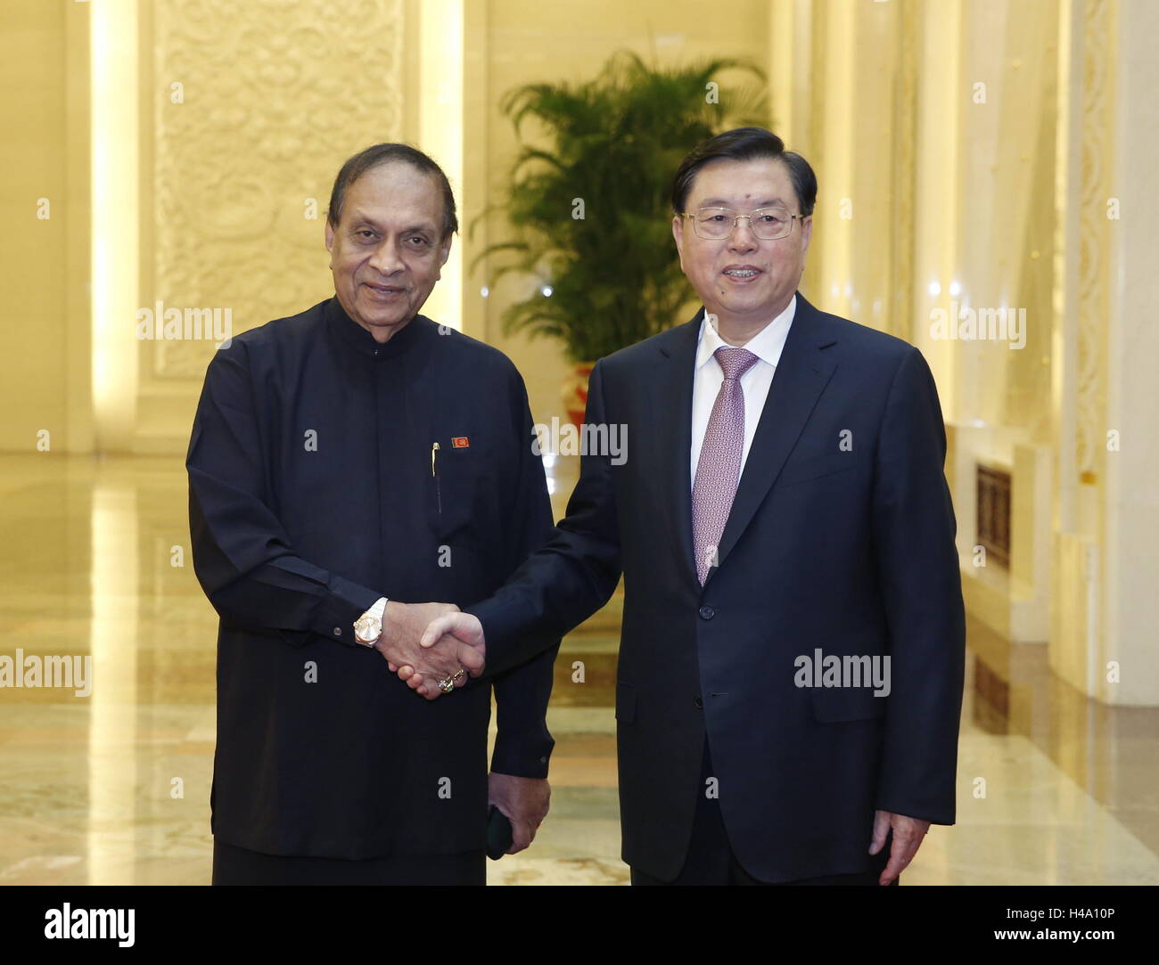Beijing, China. 14th Oct, 2016. Zhang Dejiang (R), chairman of the ...