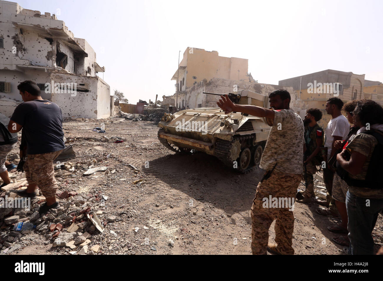 Sirte, Libya. 14th Oct, 2016. Members of the forces loyal to Libya's UN ...