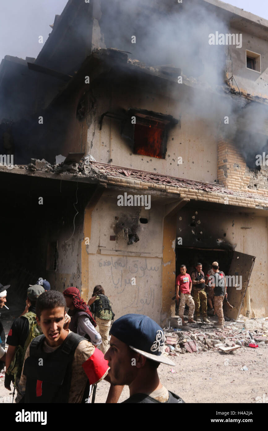 Sirte, Libya. 14th Oct, 2016. Members of the forces loyal to Libya's UN ...