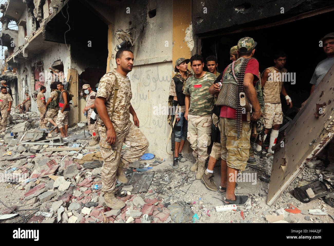 Sirte, Libya. 14th Oct, 2016. Members of the forces loyal to Libya's UN ...