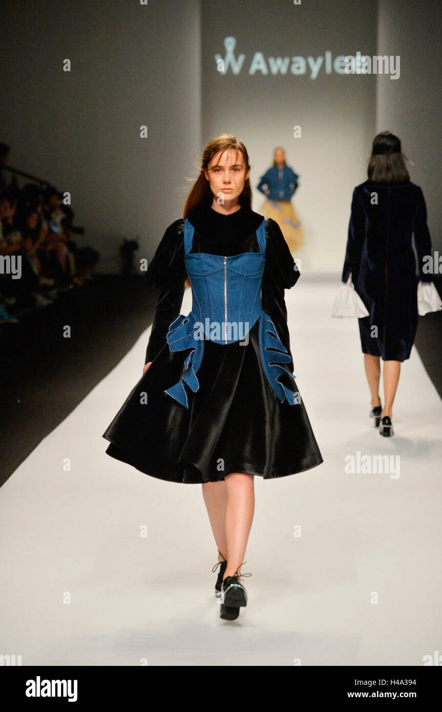Shanghai, China. 14th Oct, 2016. A model presents a creation of the ...