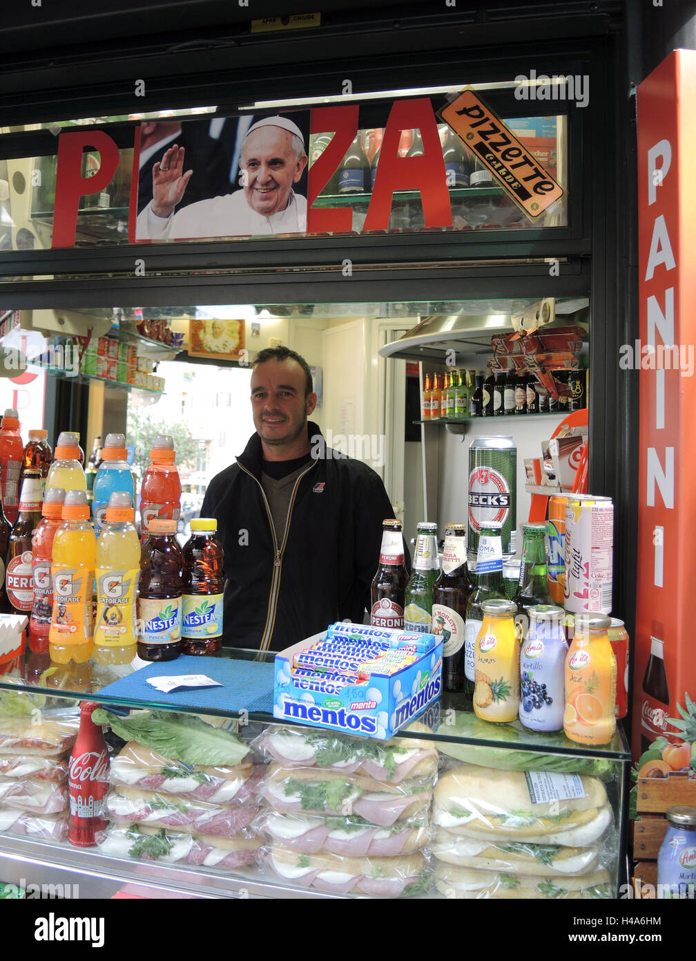 Rome, Italy. 14th Oct, 2016. Salesman Fabrizio stands in his shop on ...