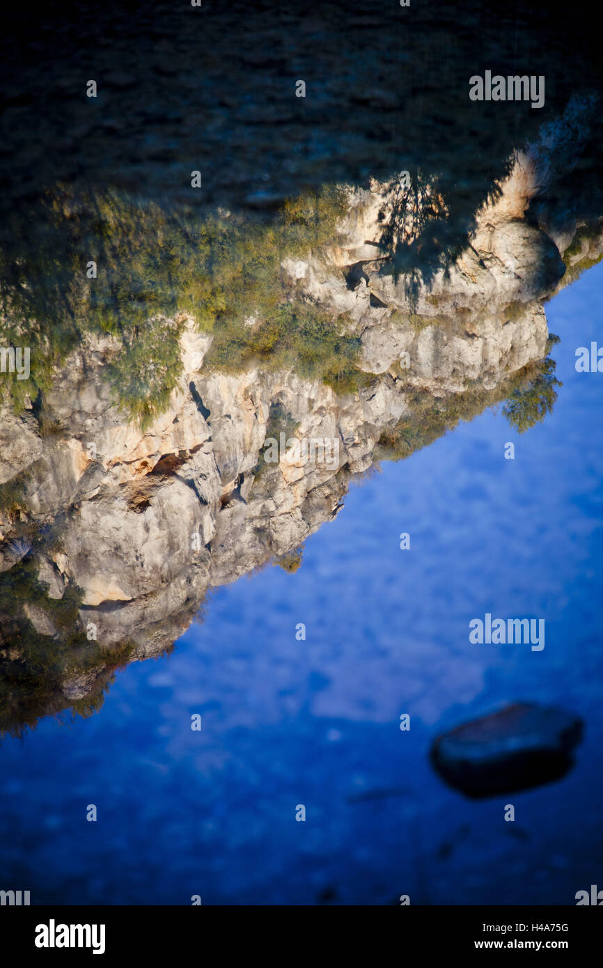 Water reflection, mountains, rocks Stock Photo - Alamy