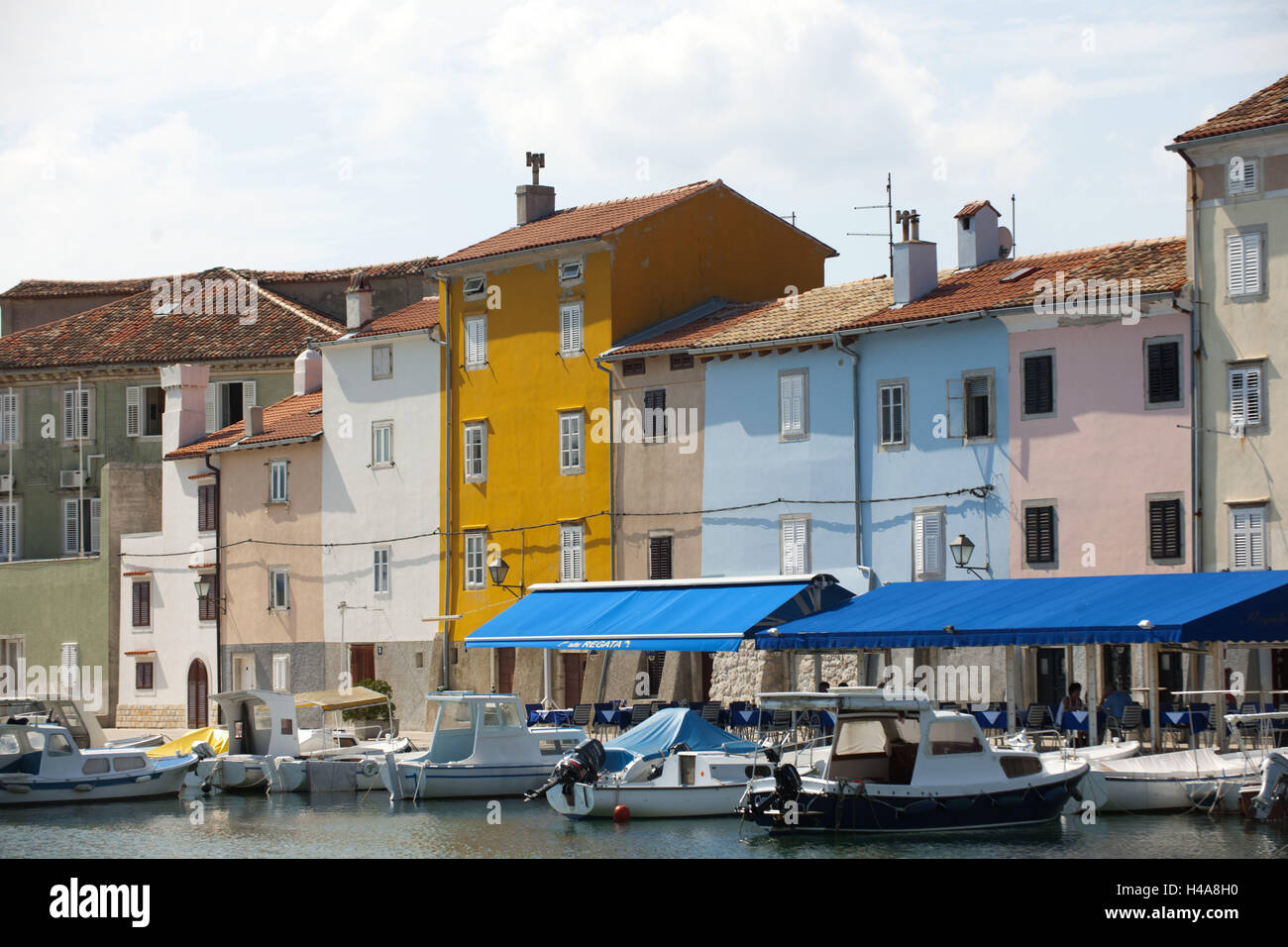 Croatia, island Cres, city Cres, coloured houses in the harbour Stock ...