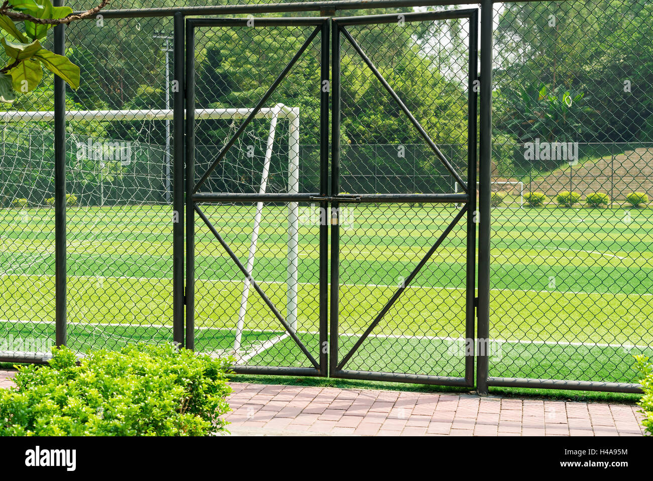 soccer field being locked with padlock Stock Photo - Alamy