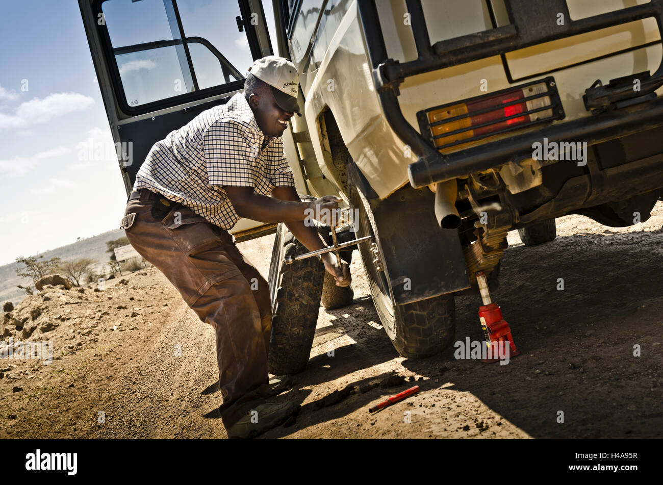 Africa, Tanzania, East Africa, road, breakdown, flat tyre, tyre change ...