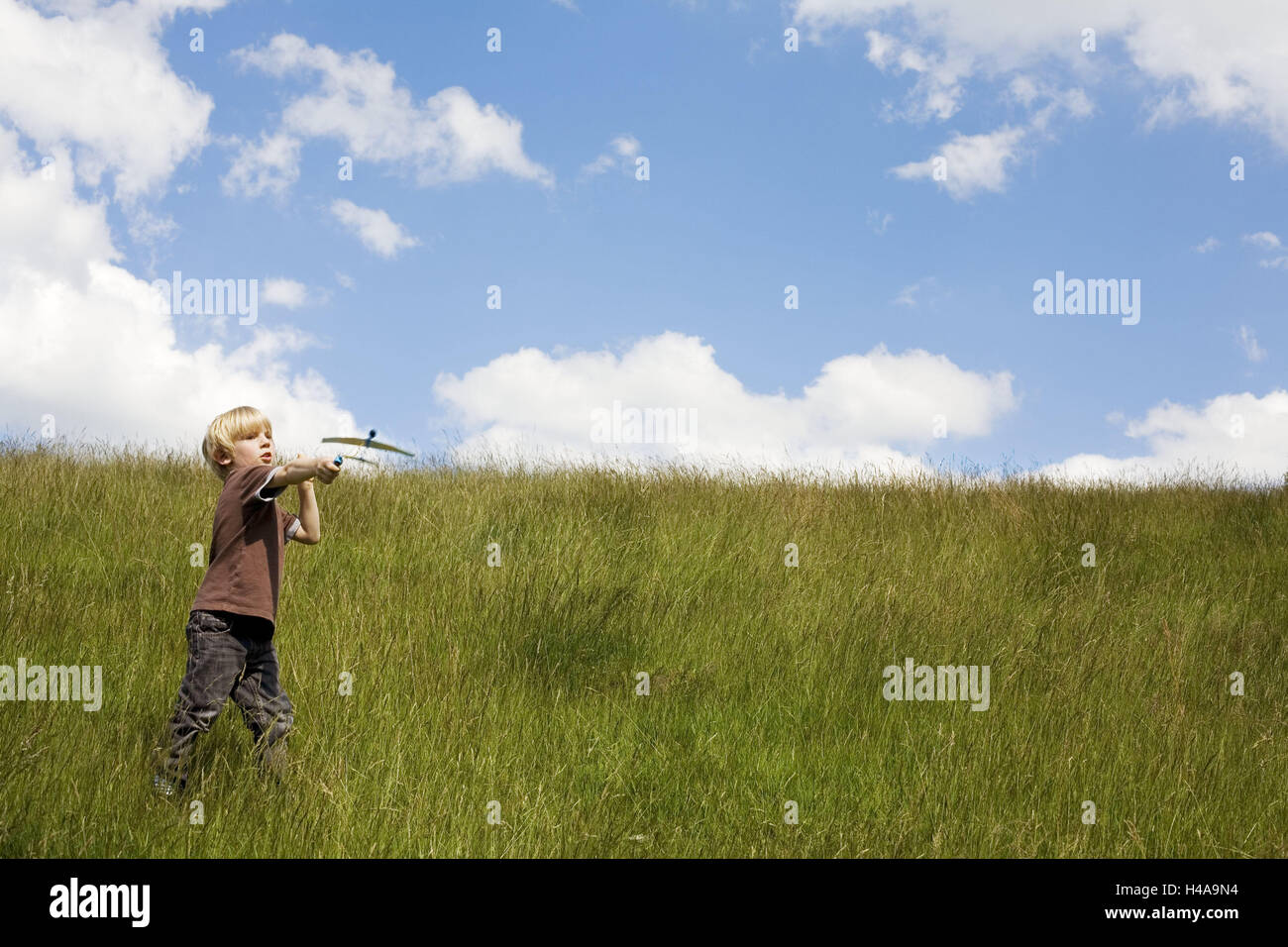 Aim boy catapult child outside hi-res stock photography and images - Alamy