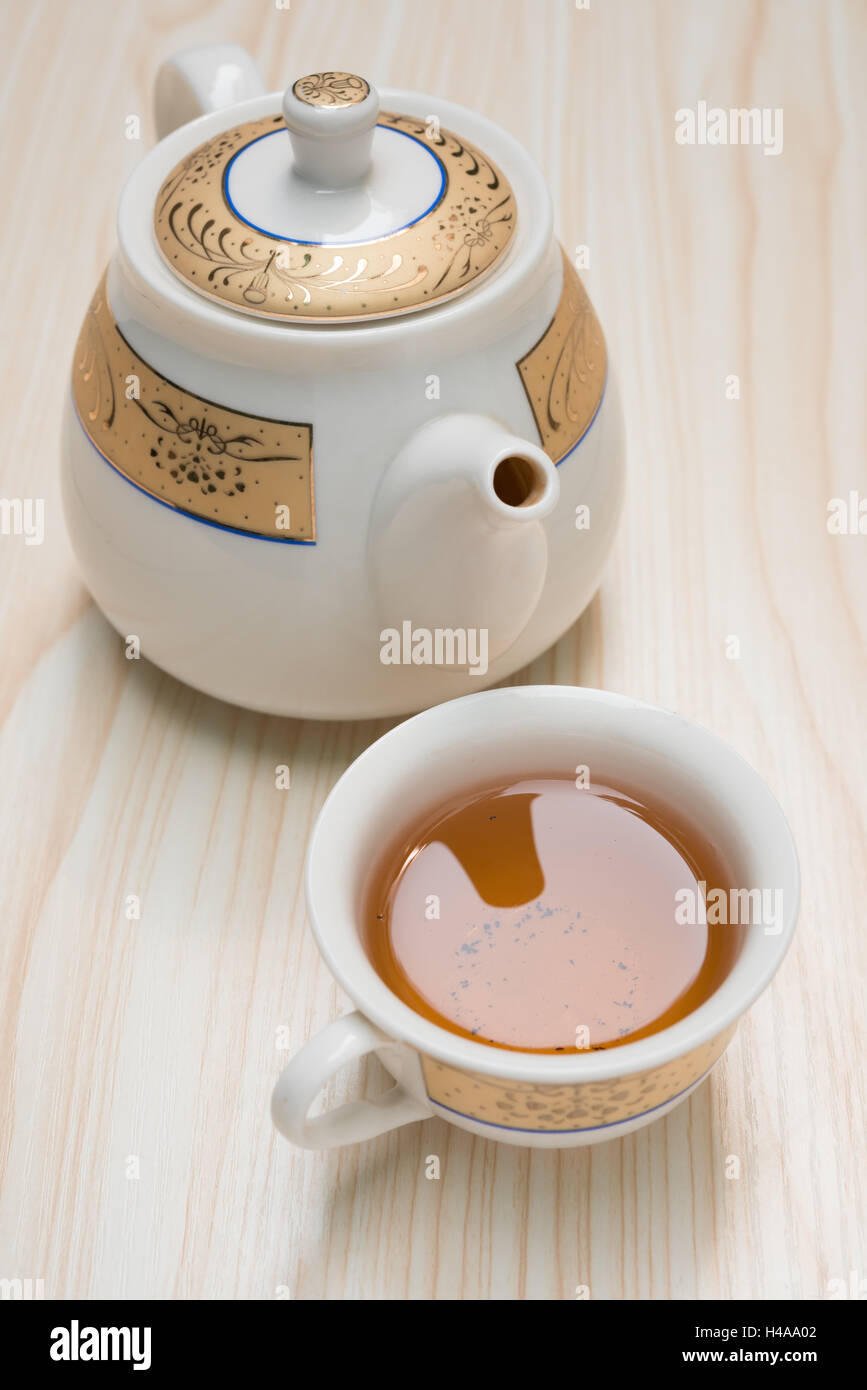 top view cup of tea and teapot on wood table Stock Photo - Alamy