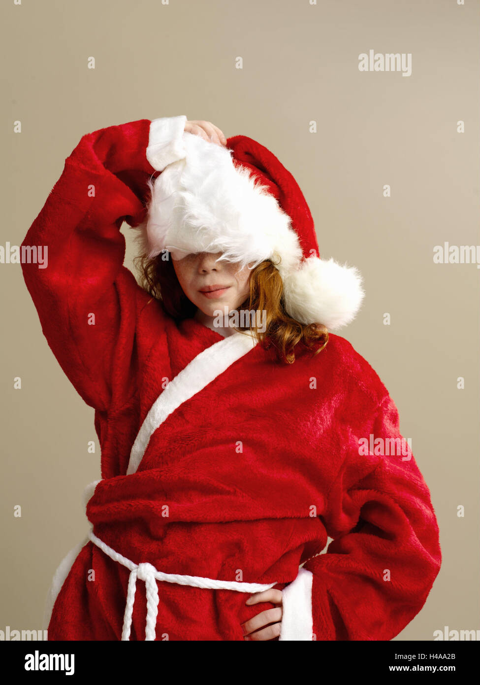 Girl, red-haired, Santa Claus's costume, outsize, cap, slips, panels ...