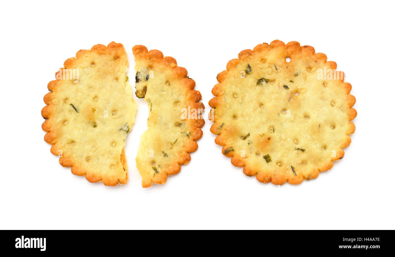 top view broken and intact crispy crackers on a white background Stock ...
