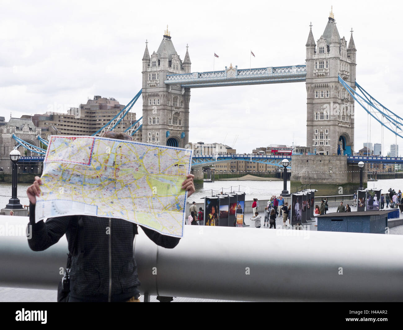 England, London, Tower Bridge, young woman with city map Stock Photo ...