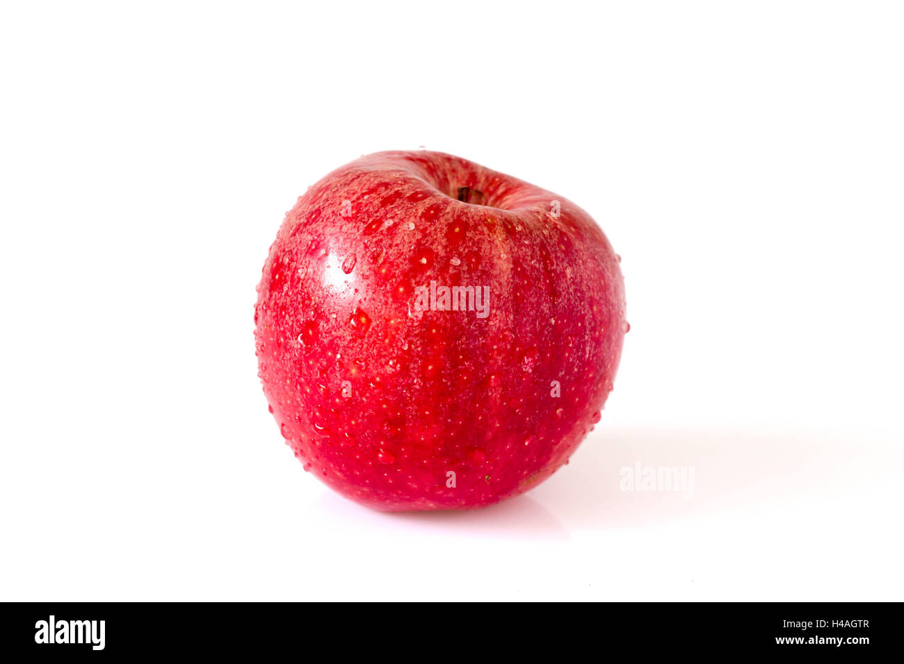 Red apple with drops on white background Stock Photo - Alamy