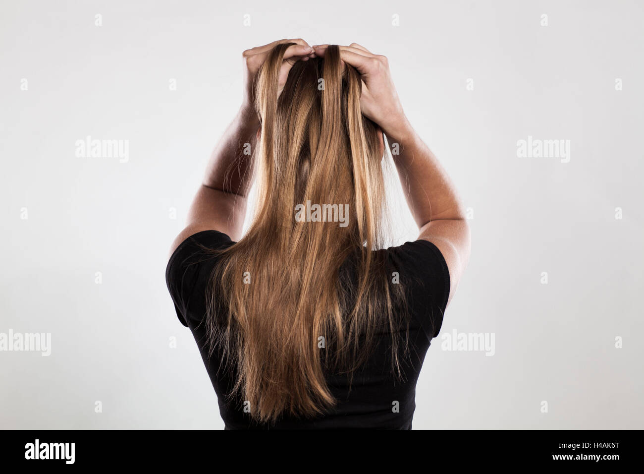 Woman plait back view hi-res stock photography and images - Alamy