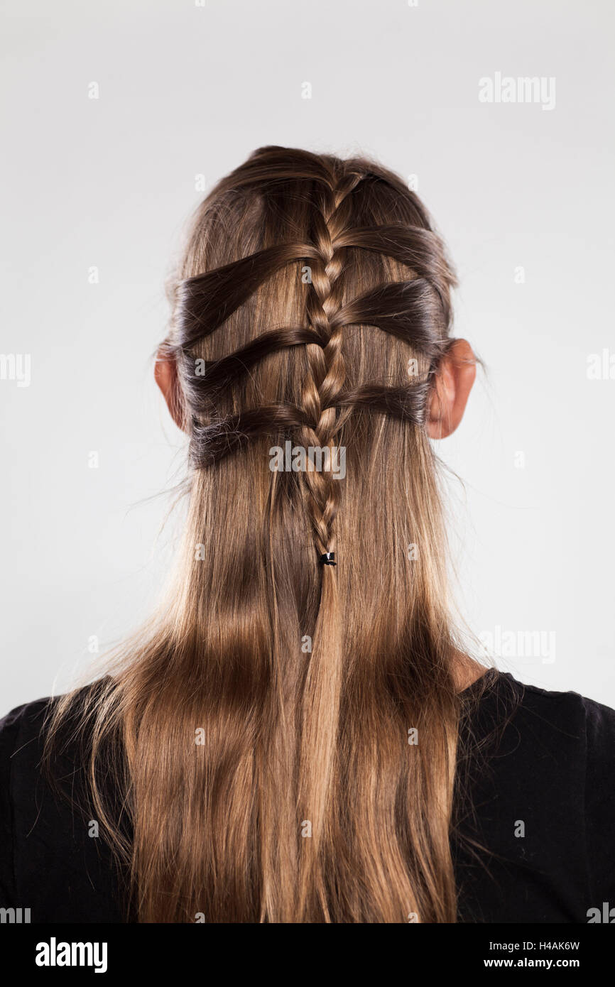 Instructions braided hairstyle plait rear view step 2 of 2 Stock Photo ...