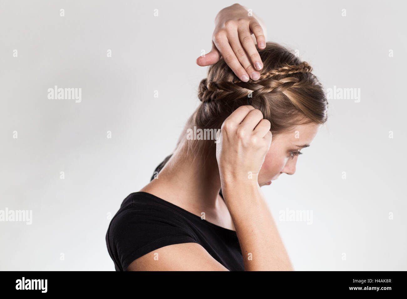 Instructions double plait step 4 of 5 Stock Photo - Alamy