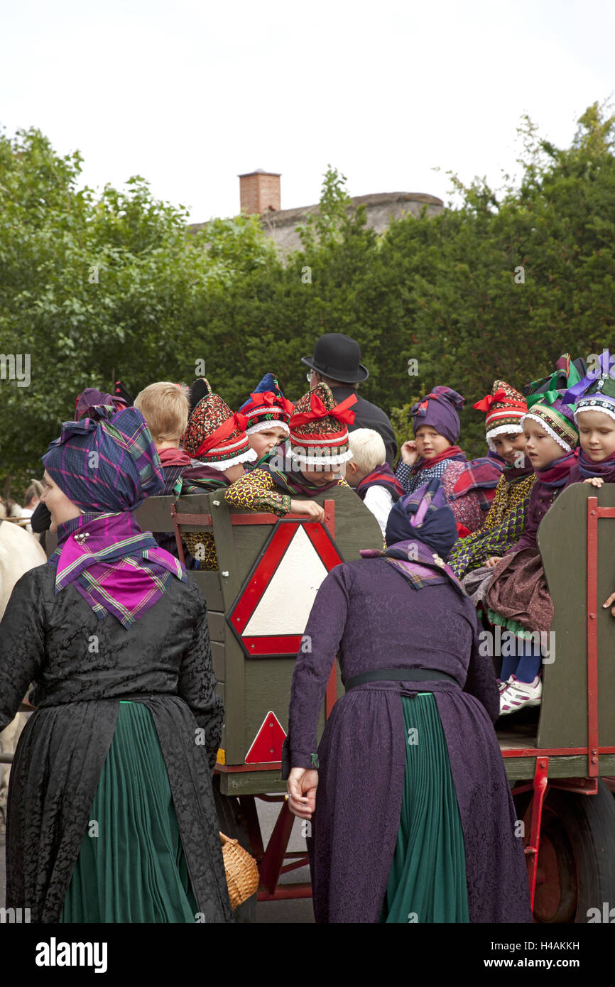 Carriages, children, national costumes, procession, public festival ...