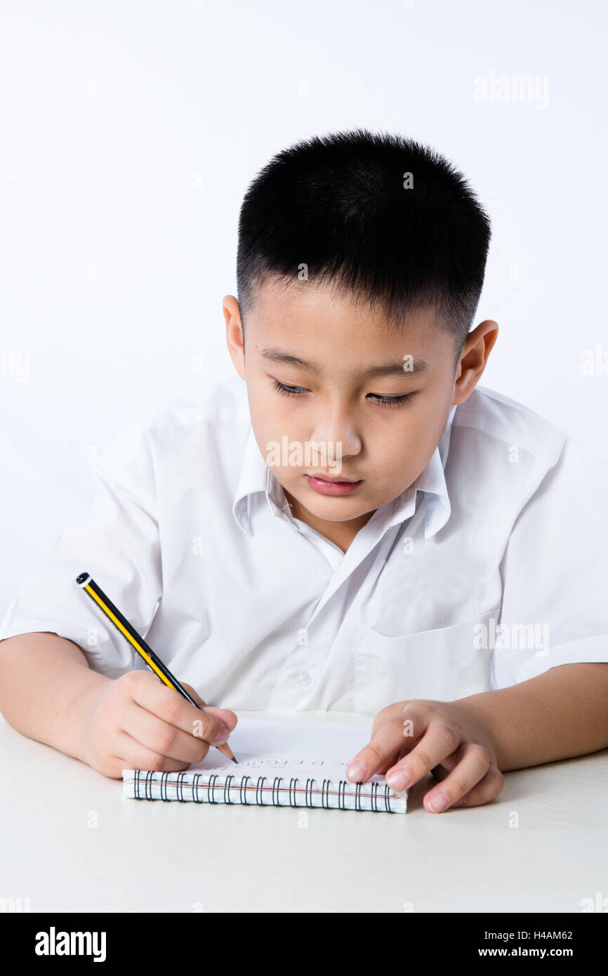 Boy writting school hi-res stock photography and images - Alamy