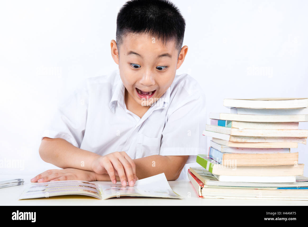 Surprise Asian Chinese Little Boy Wearing Student Uniform Reading ...