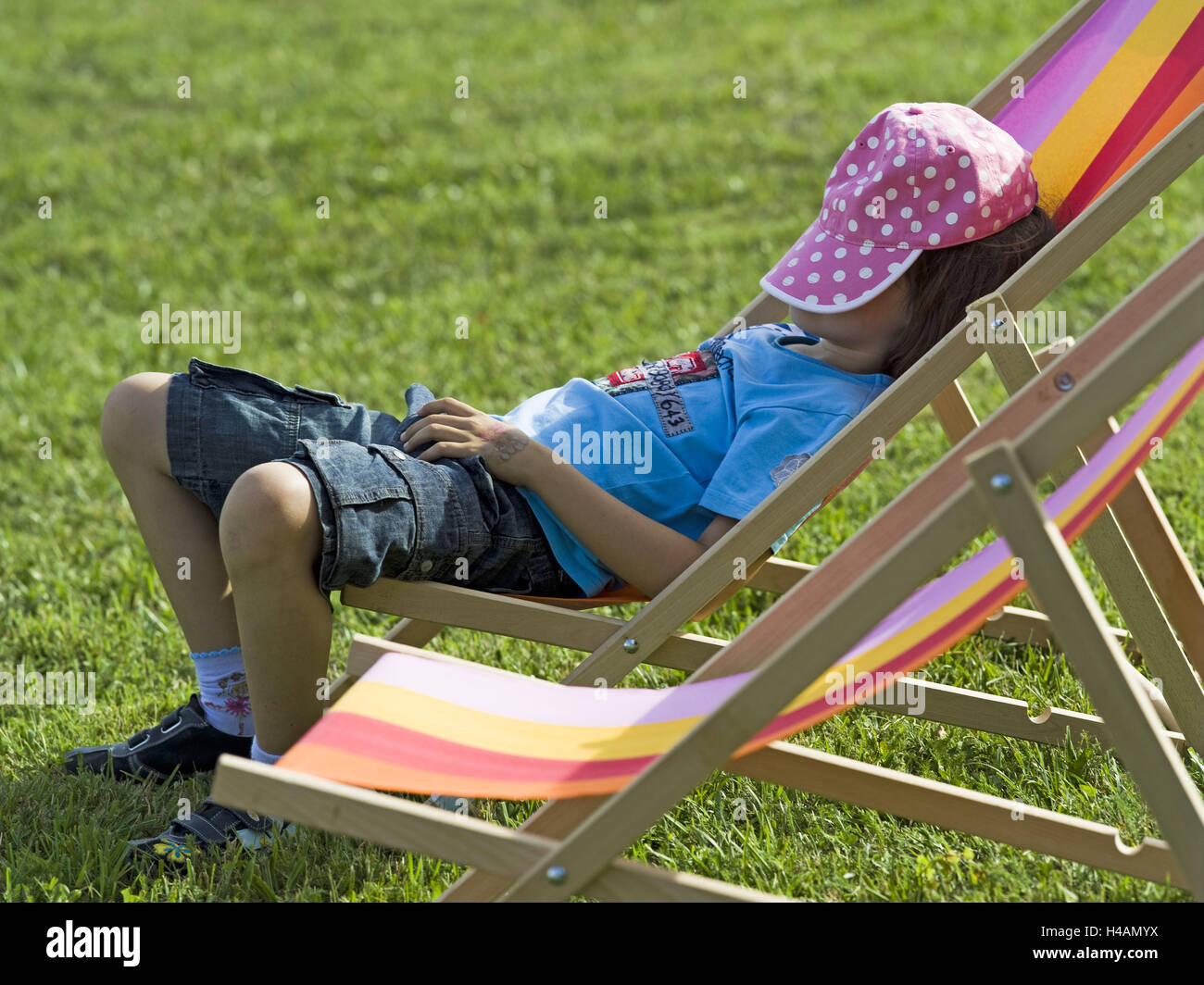 Garden, meadow, deck chairs, child, girl, cap, sleep, summer Stock ...