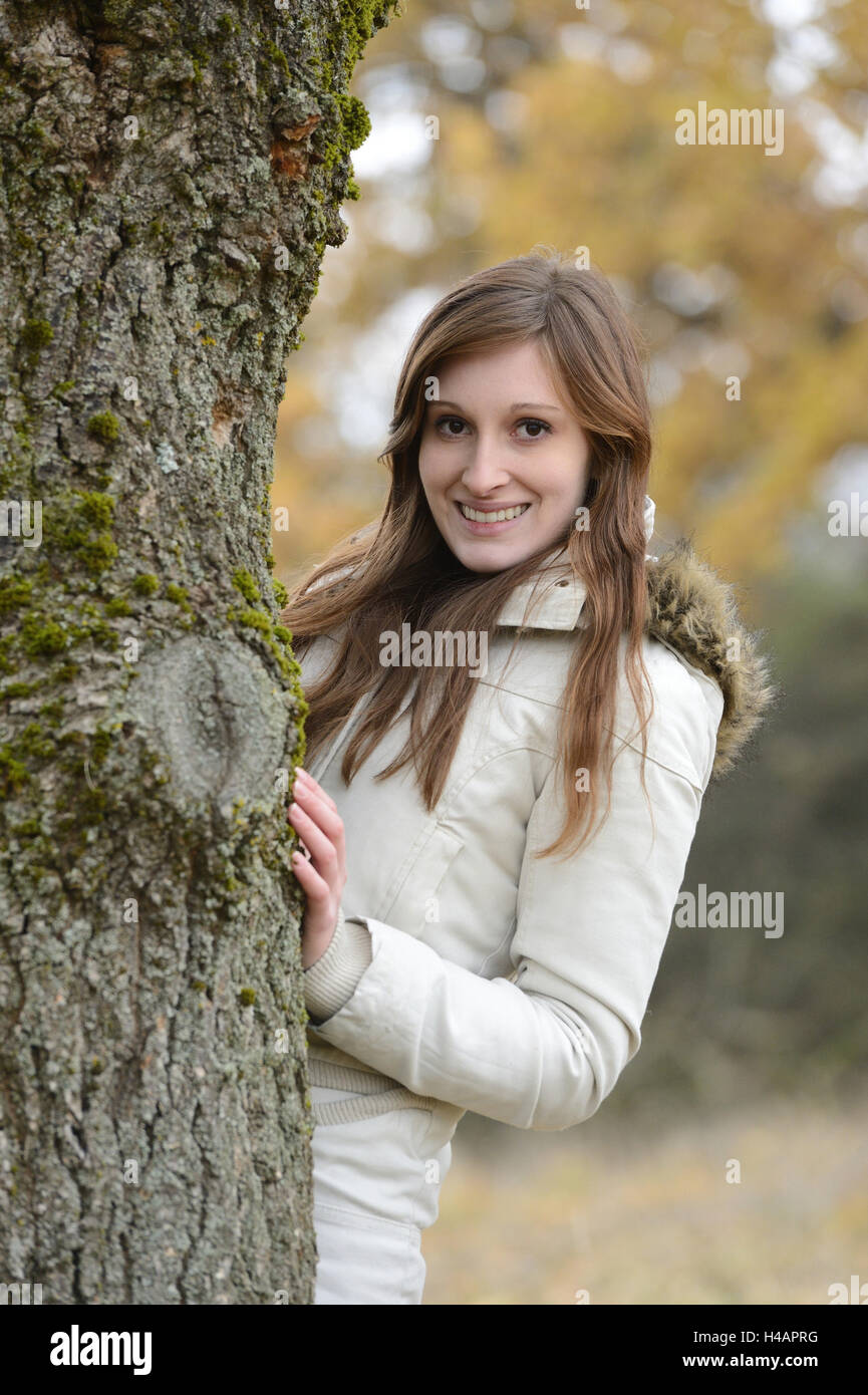 Young woman, trunk, hide, view camera, half portrait Stock Photo - Alamy