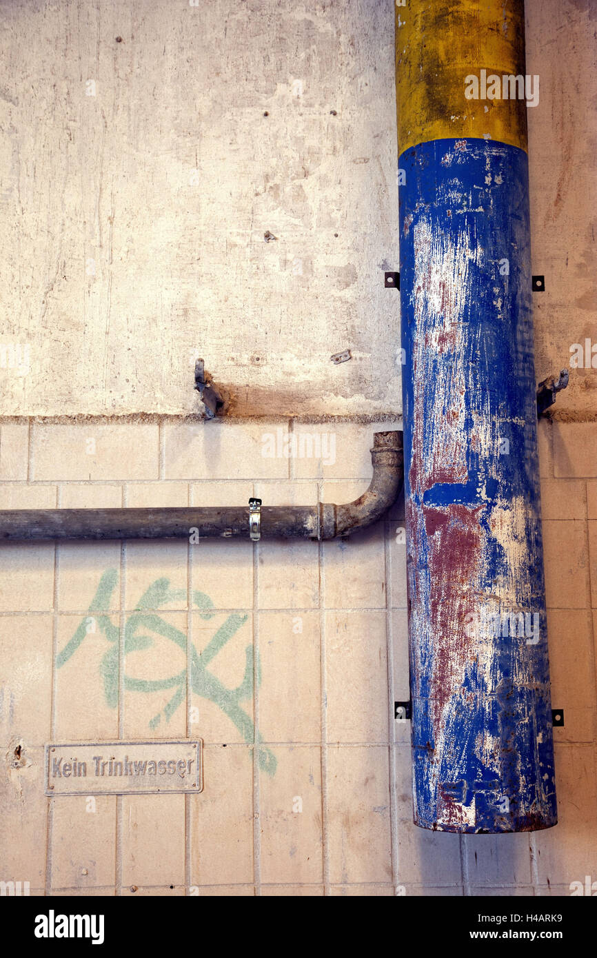 Wall, pipes, graffiti, disused Stock Photo - Alamy