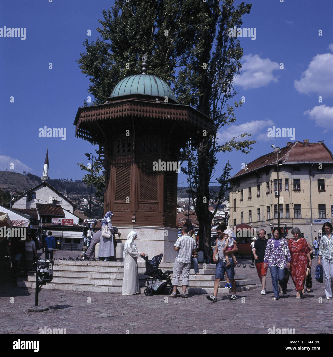 Bosnia-Herzegovina, Sarajevo, Bascarsija, Sebilj Fountain, passers-by ...