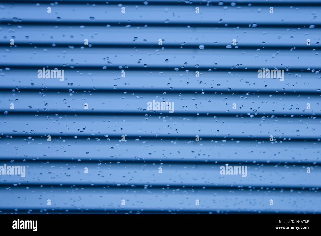 Raindrops on windowpane Stock Photo - Alamy