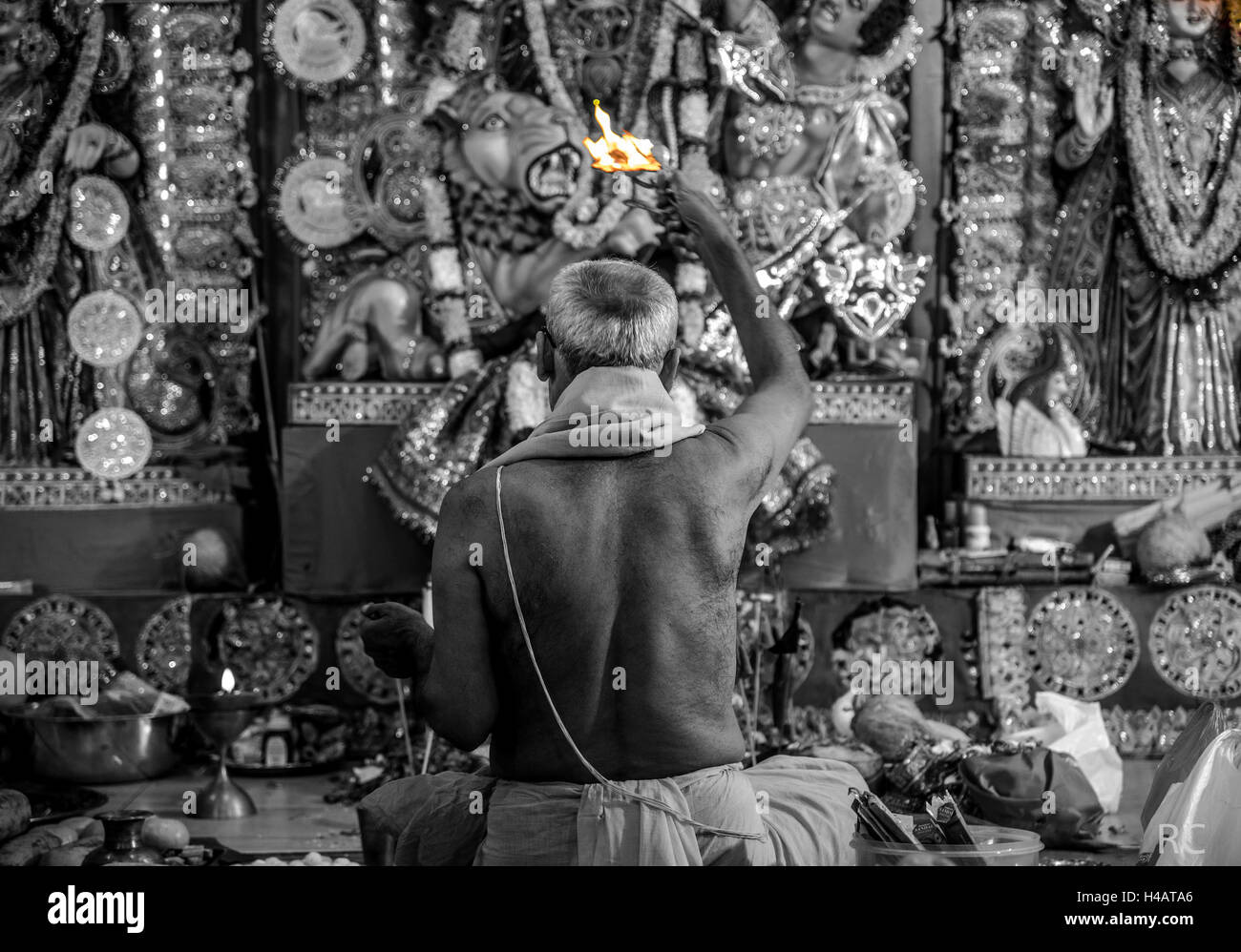 Priest offering his prayer to Goddess Durga in Jakarta Indonesia Stock ...