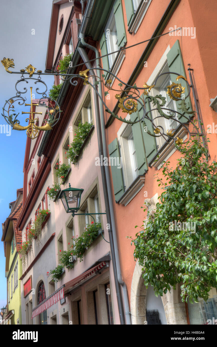 Old blacksmithing art, guild symbol, in Rothenburg ob der Tauber ...