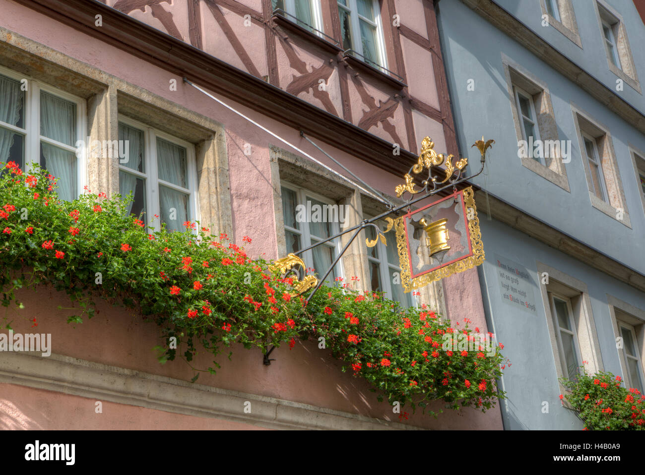 Old blacksmithing art, guild symbol, in Rothenburg ob der Tauber ...