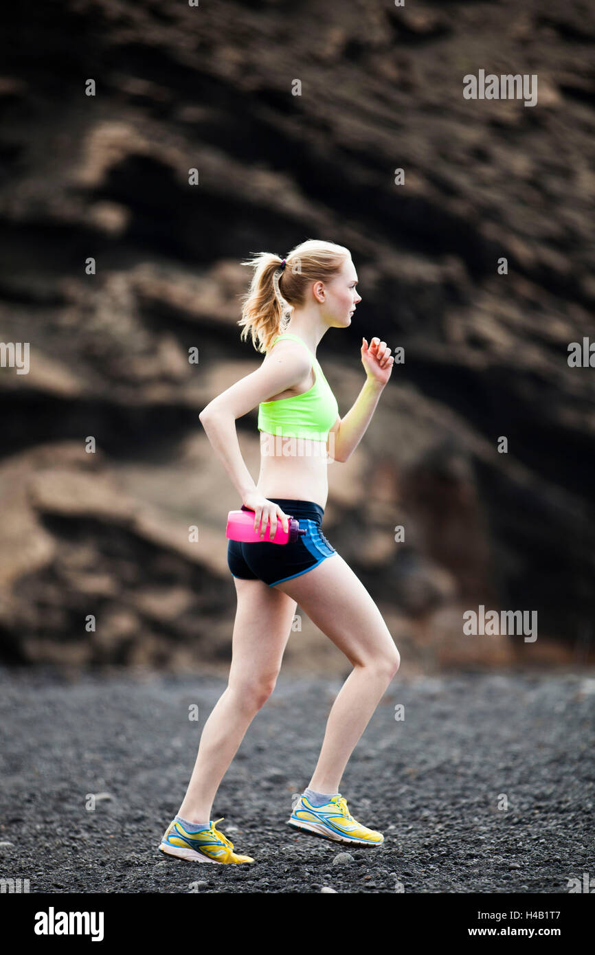 Woman jogging hi-res stock photography and images - Alamy