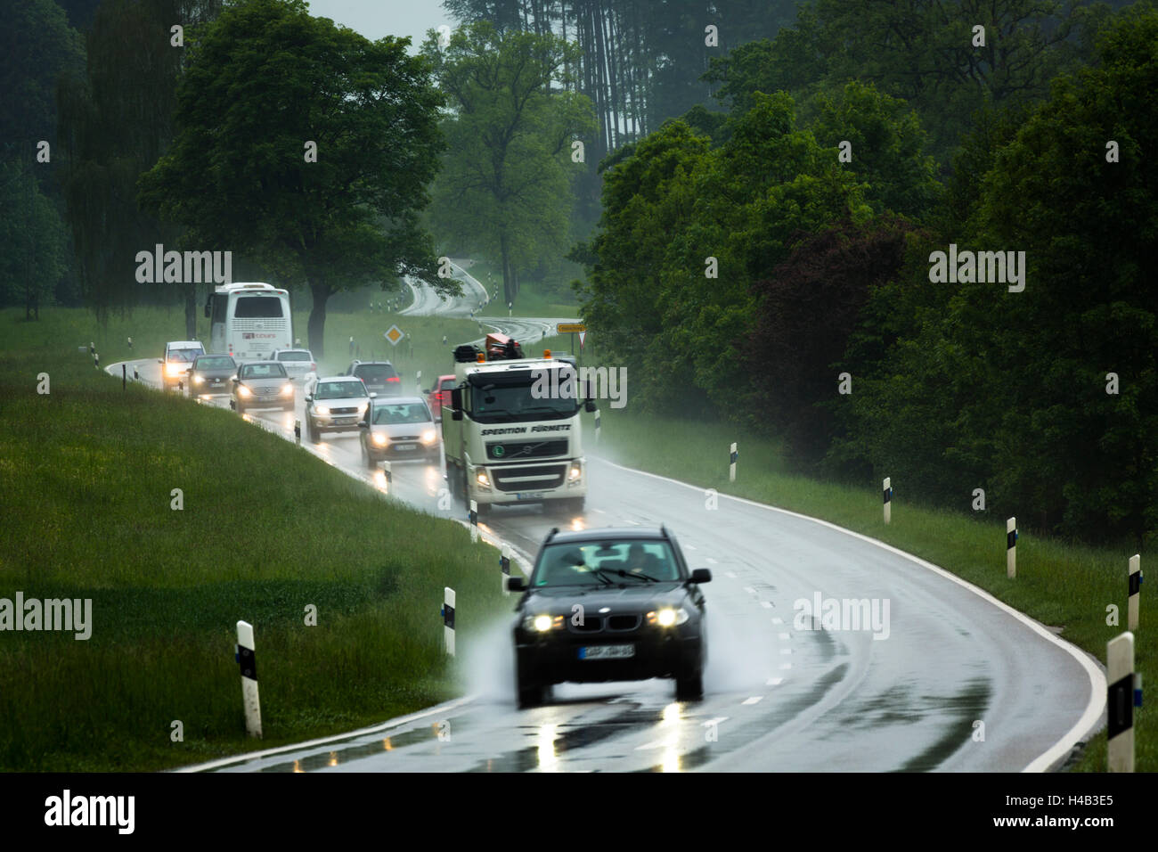 Germany, Bavaria, country road in the rain Stock Photo - Alamy