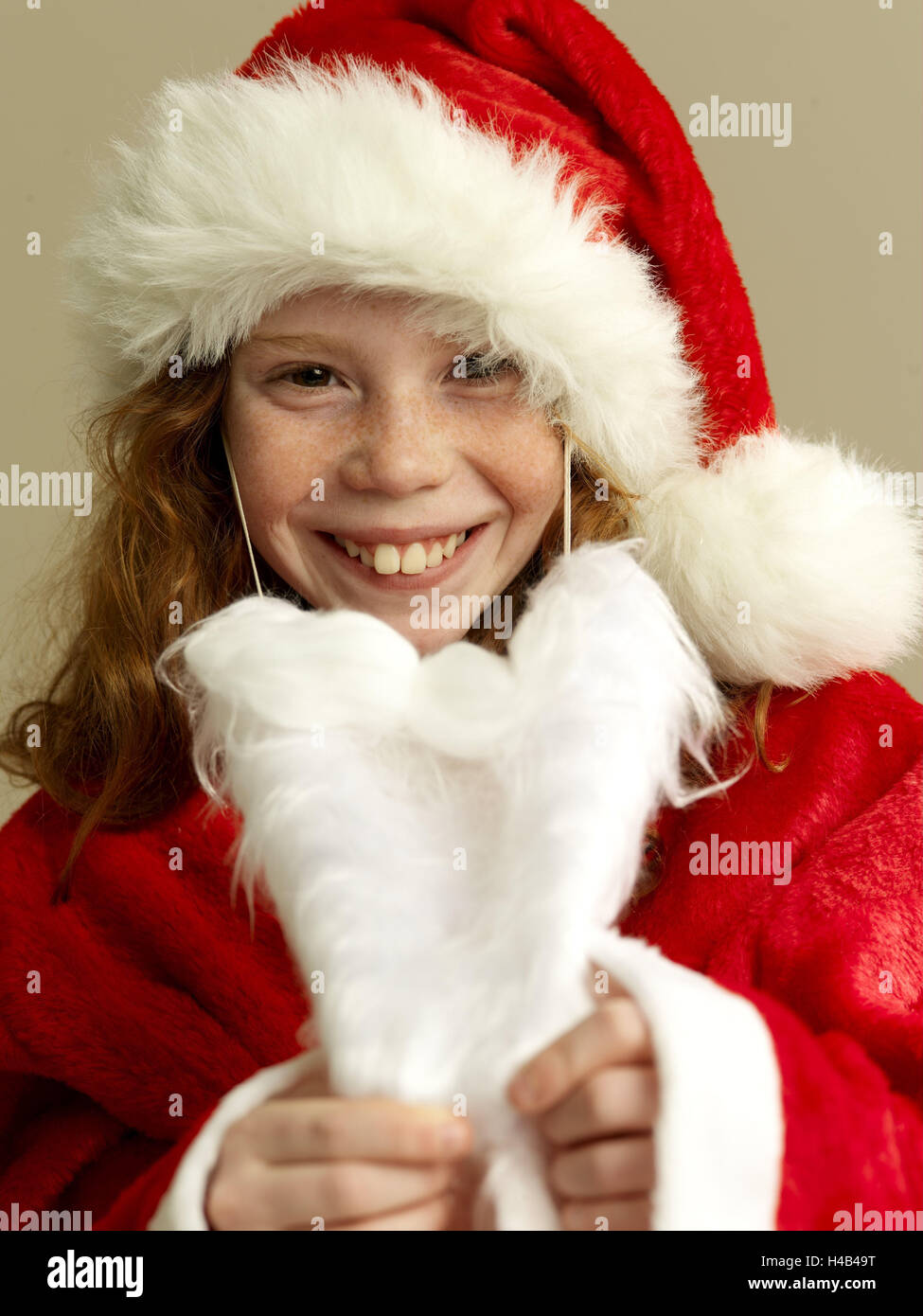 Girls, redhaired, Santa Claus outfit, beard, pull down, cheerfully ...