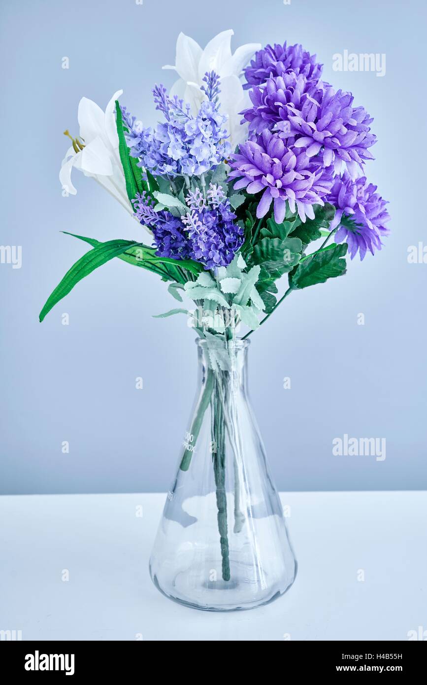 A studio photo of plastic display flowers Stock Photo - Alamy
