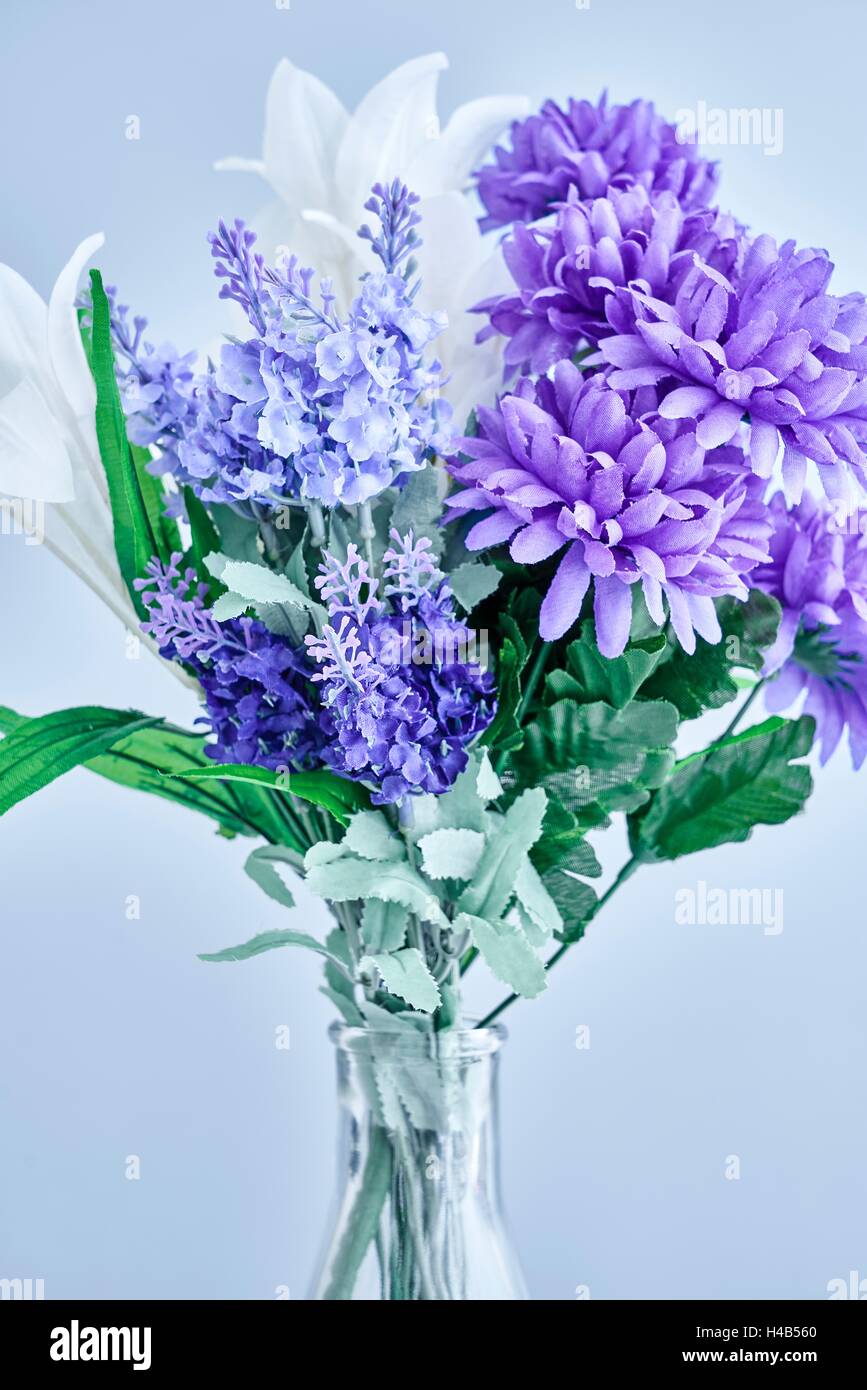 A studio photo of plastic display flowers Stock Photo - Alamy