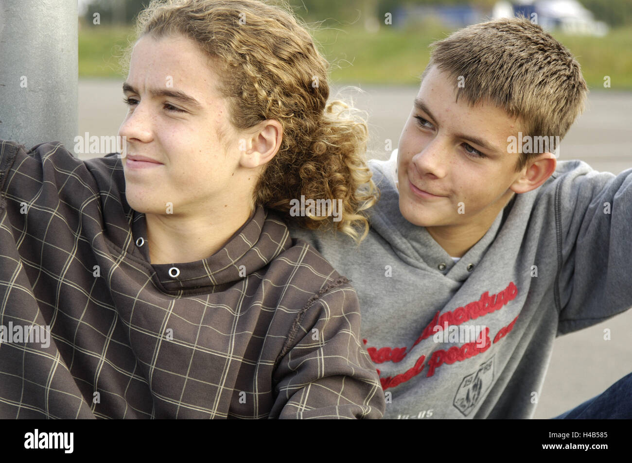 Teenagers, boys, friendship, sit, outside Stock Photo - Alamy
