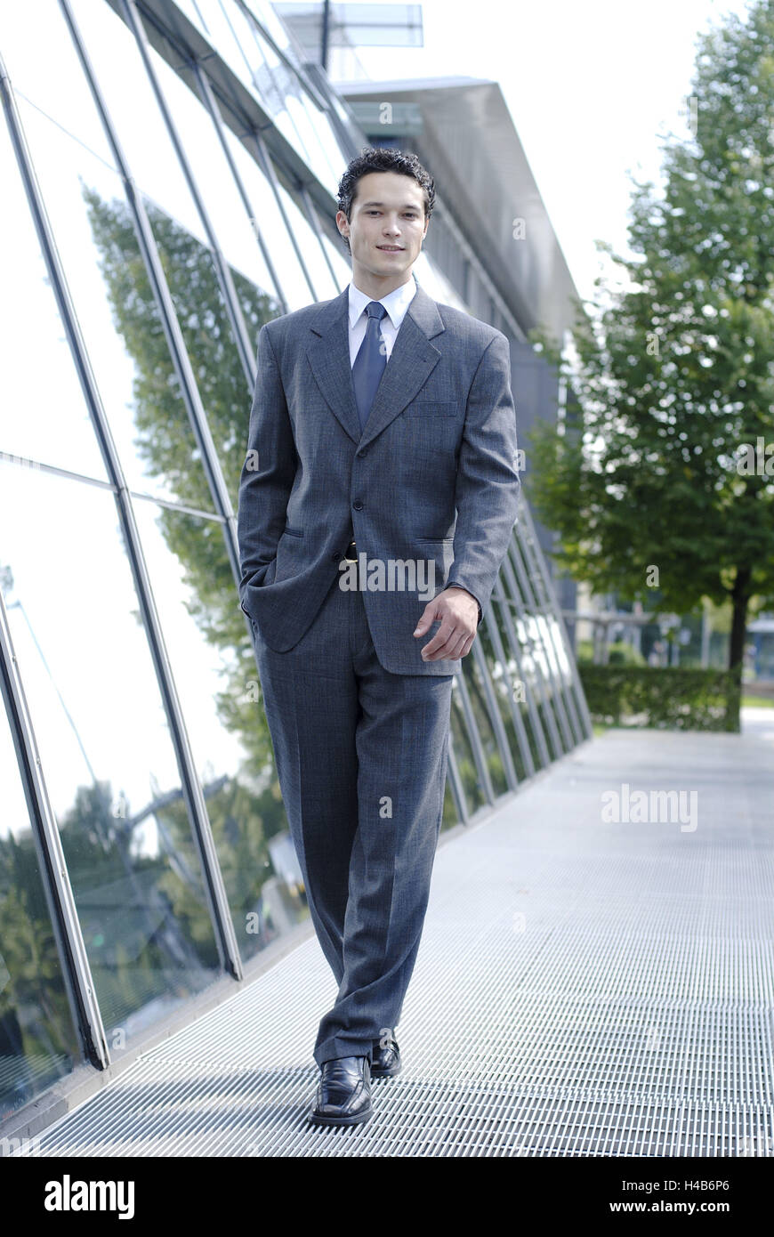 Man outside building hi-res stock photography and images - Alamy