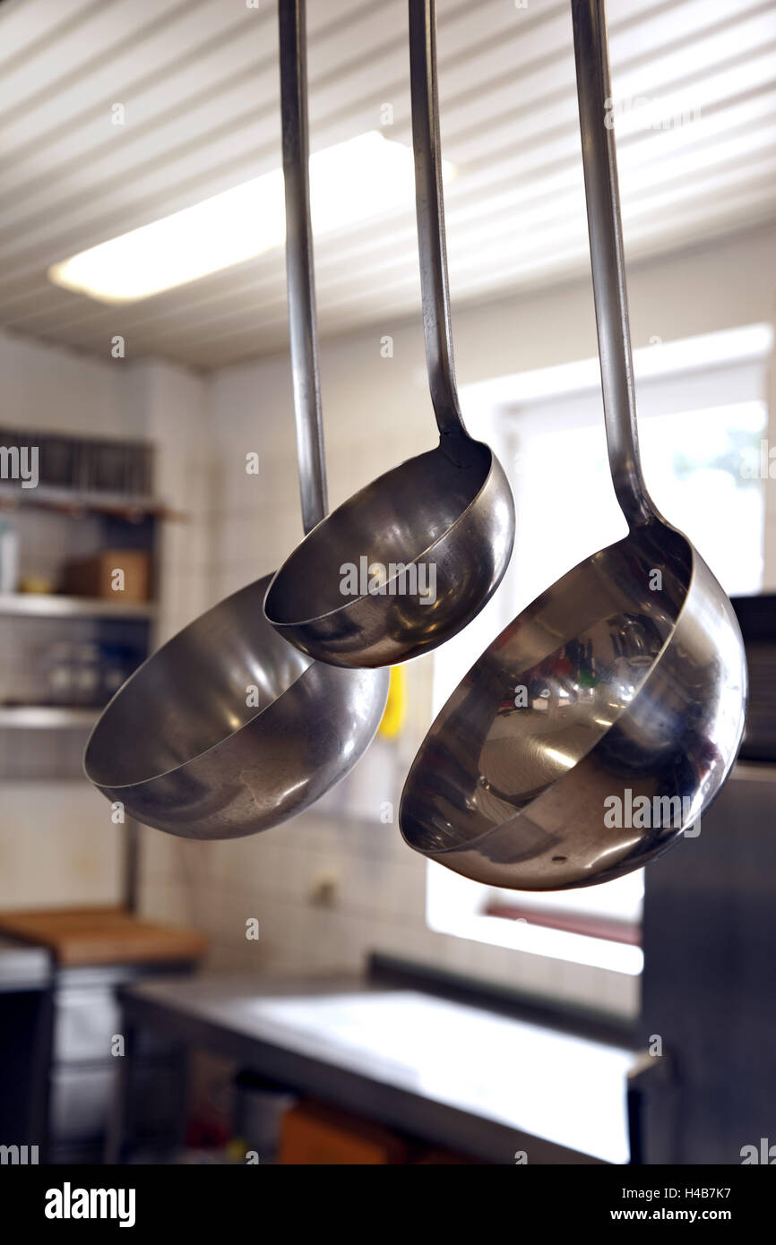 Cuisine, implements, soup tennis rackets, three, hanging Stock Photo ...