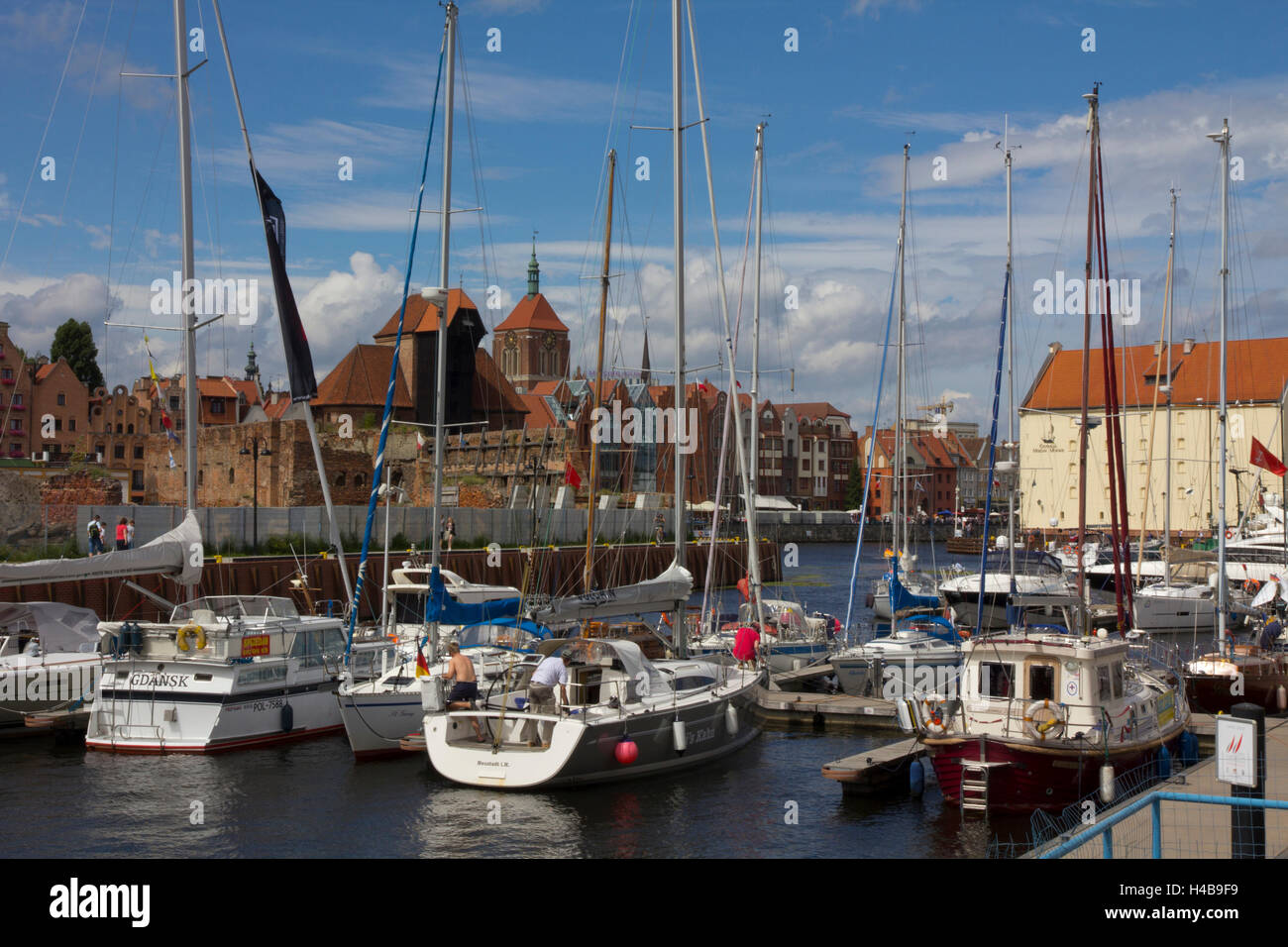 Gdansk's Old Town waterfront rises beyond this marina on the Motlawa ...