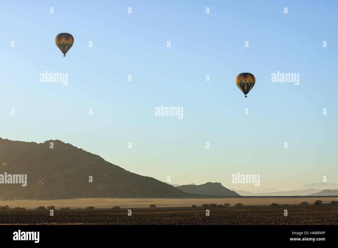 Two hot air balloons flying over the Namib Desert, Sossusvlei, Namibia ...
