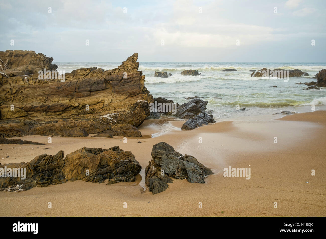 Sandy beach with large rocks at Uruguay landmark beach resort La ...