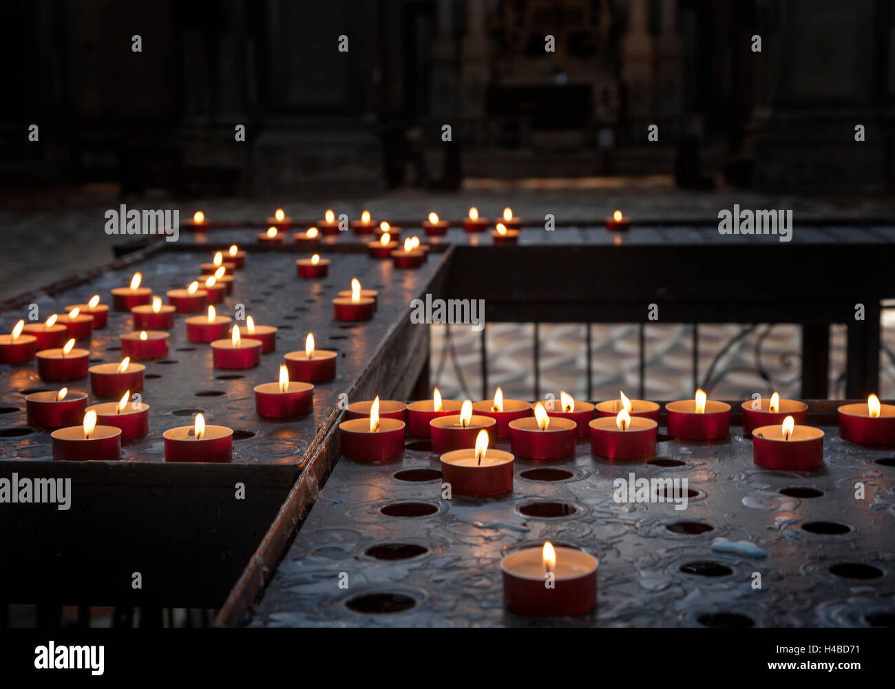 Burning lights in the church Stock Photo - Alamy