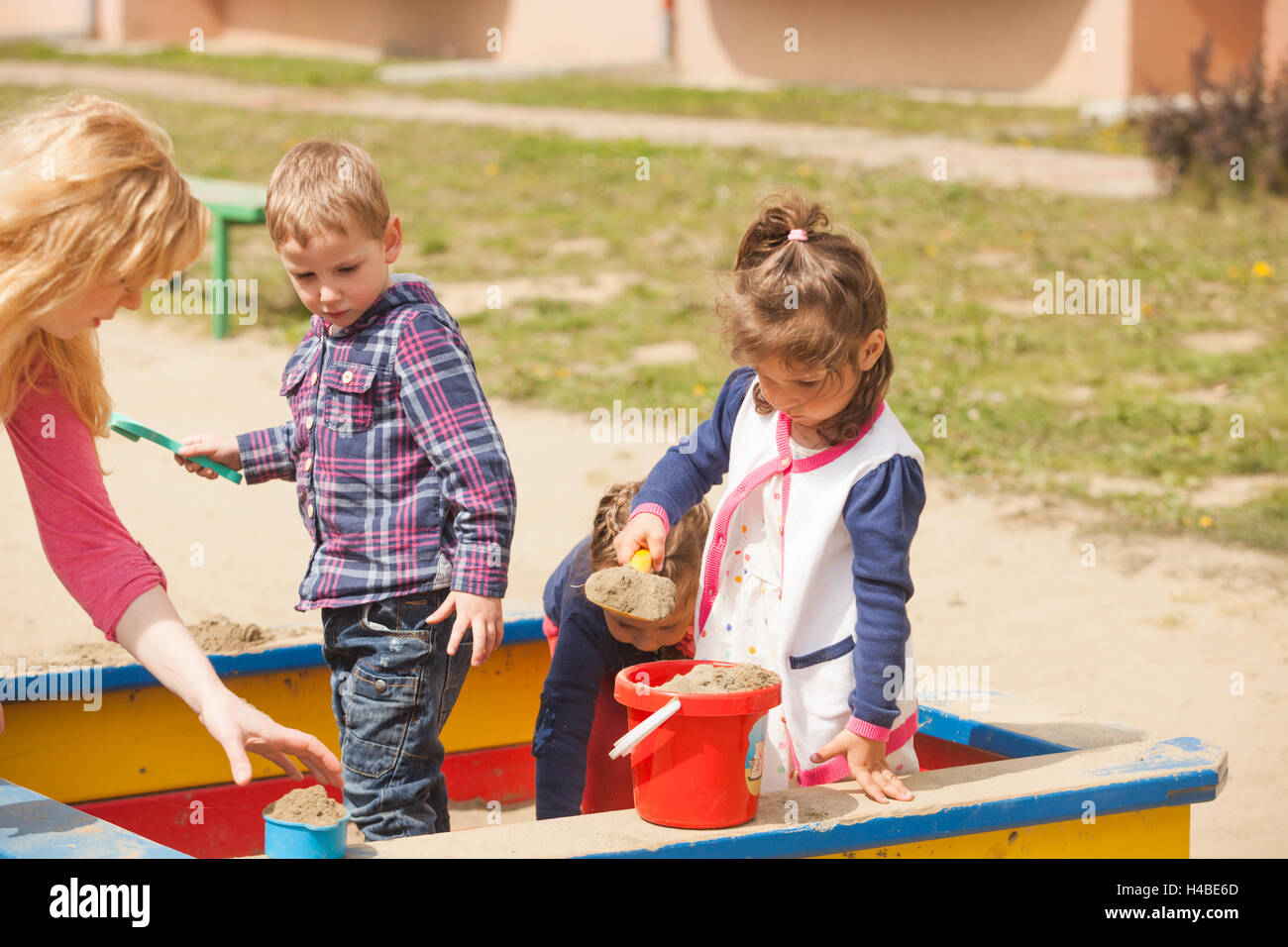 playing in the sandbox Stock Photo - Alamy