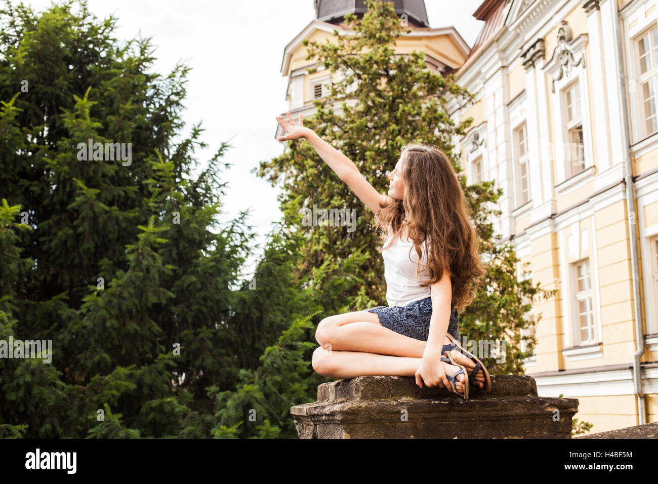 Girl near the hight school building Stock Photo - Alamy