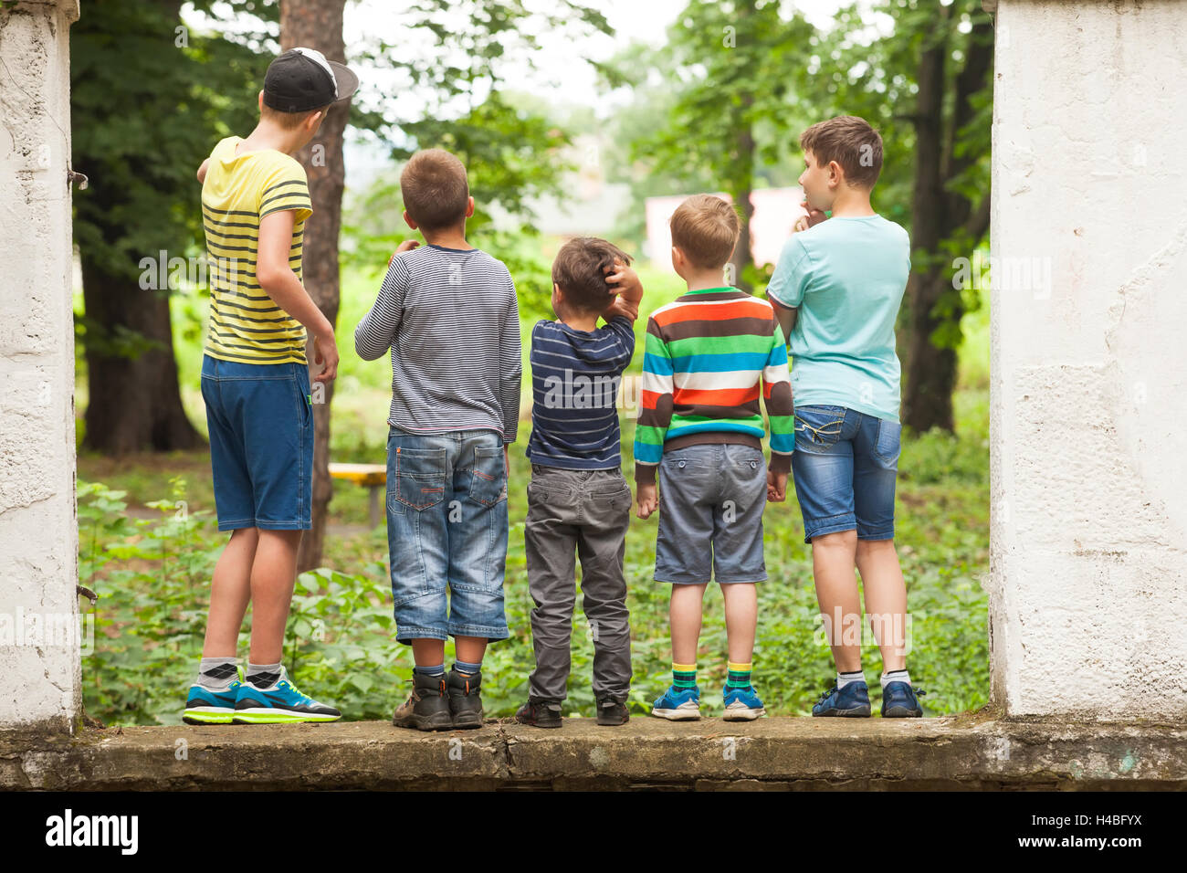 Group of guys in a row back view Stock Photo - Alamy
