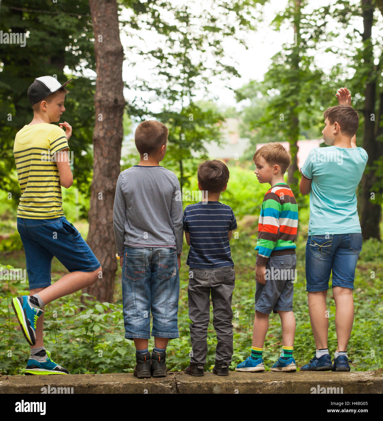 Group of guys in a row back view Stock Photo - Alamy