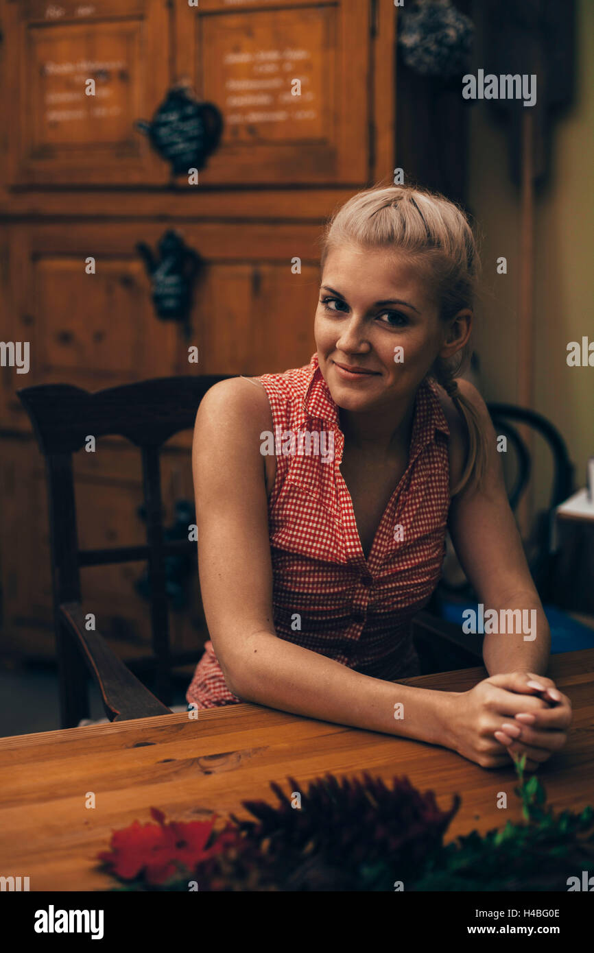 Woman in country house look with braided hairstyle Stock Photo - Alamy