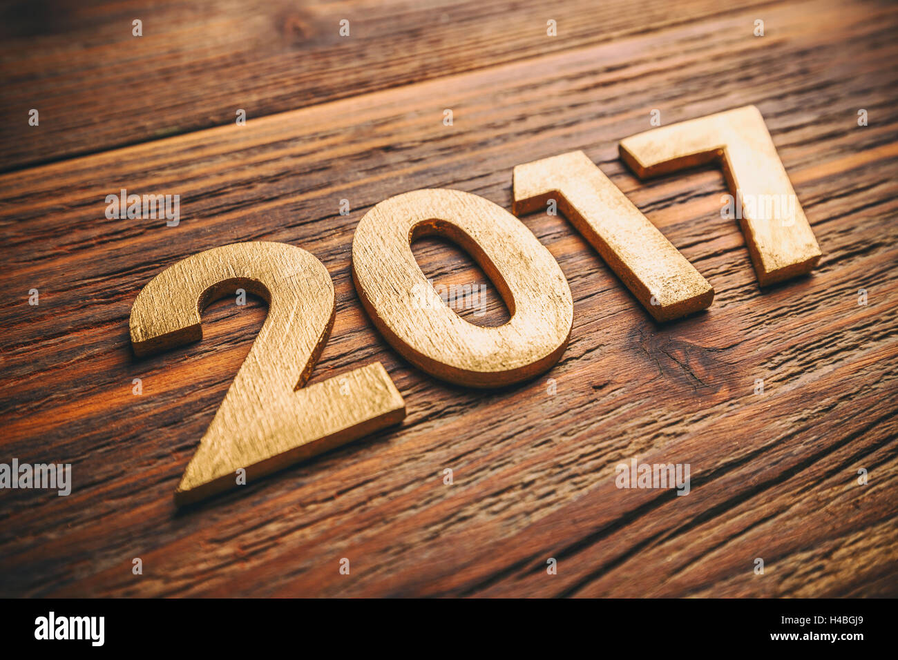 Number 2017 on old retro vintage style wooden texture Stock Photo - Alamy